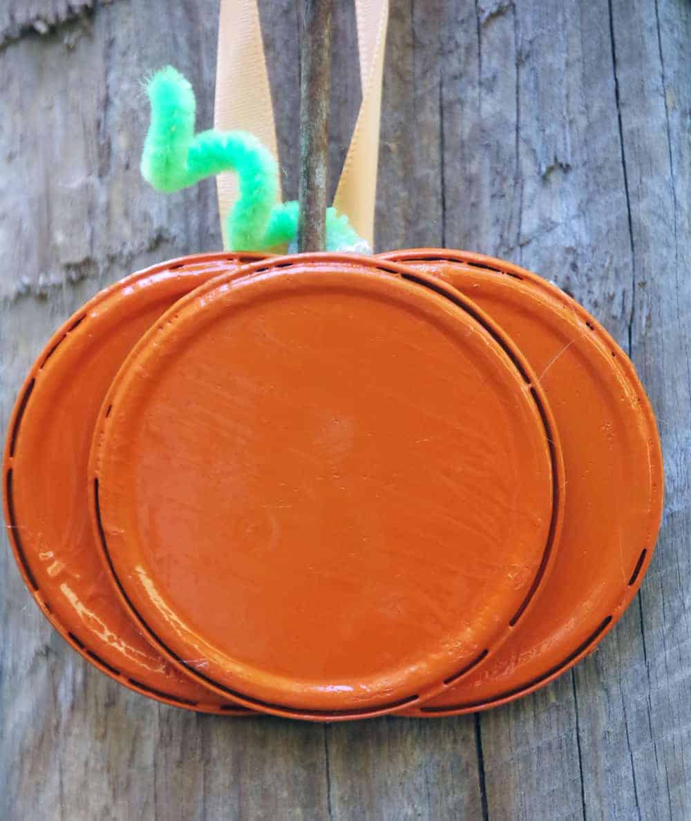 Easy Pumpkin Craft Idea Using Juice Can Lids - Turning the Clock Back